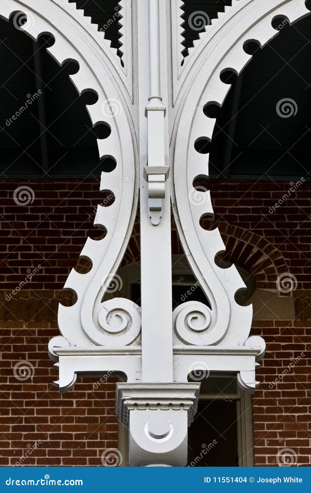 Ornate Column in Front of Brick Wall and Window Stock Photo - Image of ...