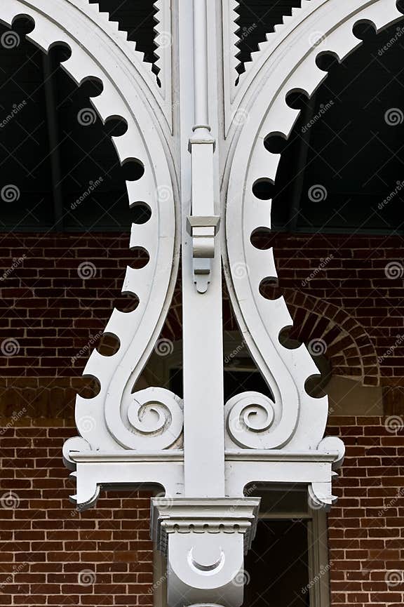 Ornate Column in Front of Brick Wall and Window Stock Photo - Image of ...