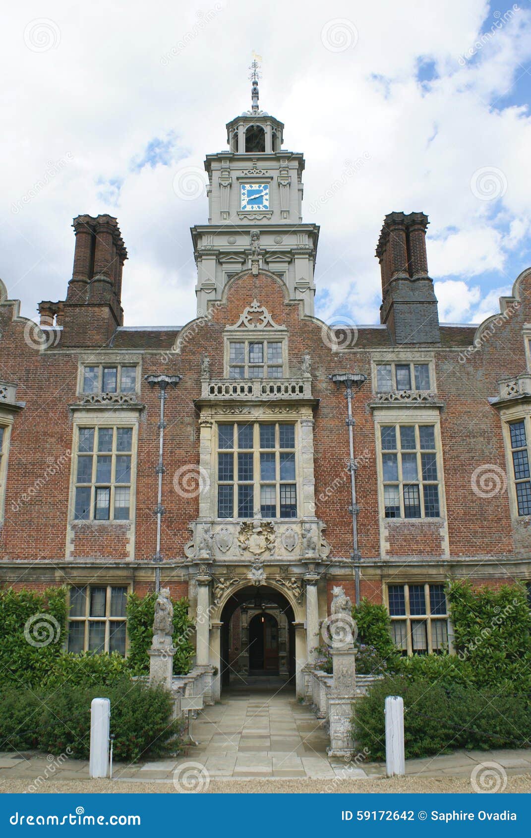 Ornate Entrance with a Clock Tower Stock Photo - Image of statues, roof ...