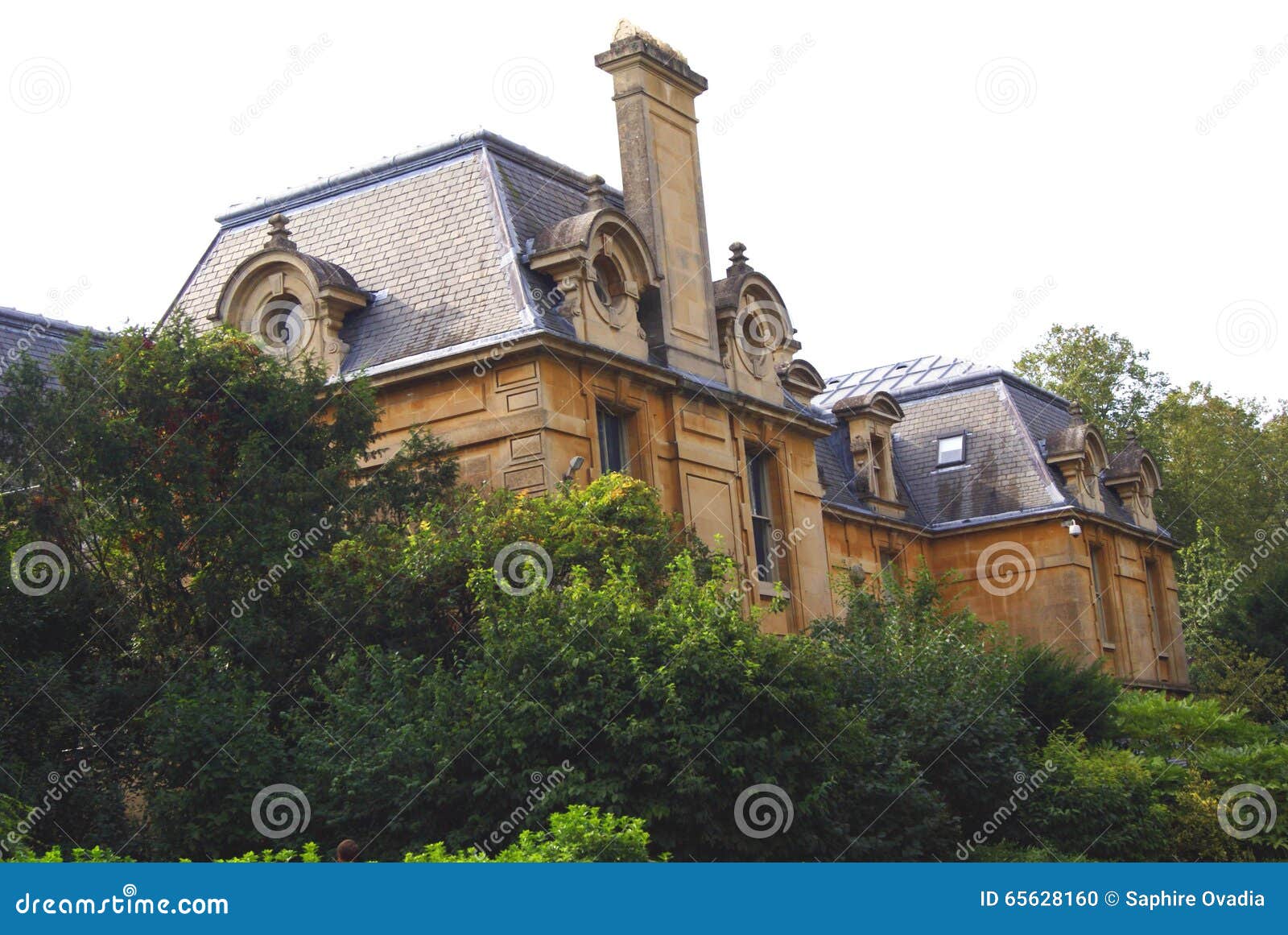 Ornate Facade with Arched Dormer Windows and Chimney Stock Photo ...