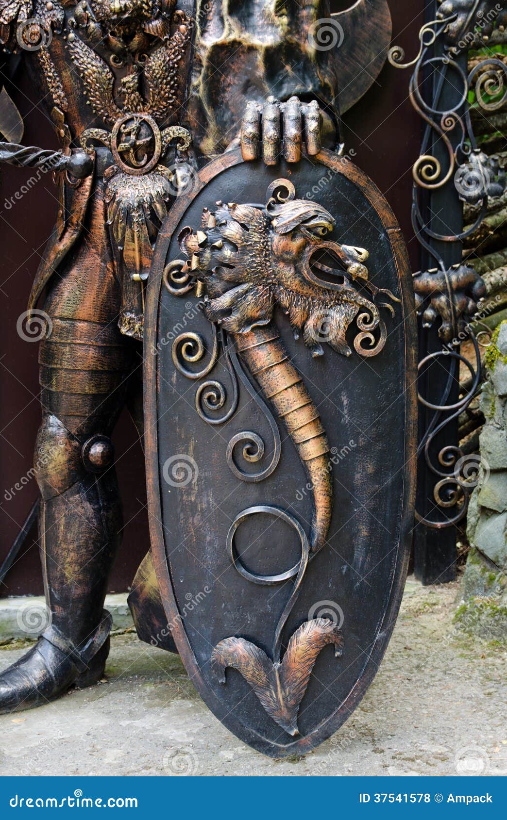 Ornate Shield of a Bronze Statue Stock Photo - Image of head, armour ...