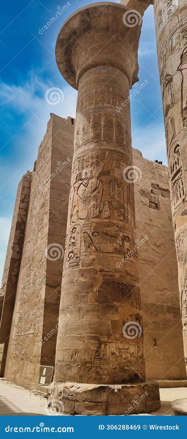 Ornate Stone Columns Frame Two Towering Pillars in an Intricate Display ...