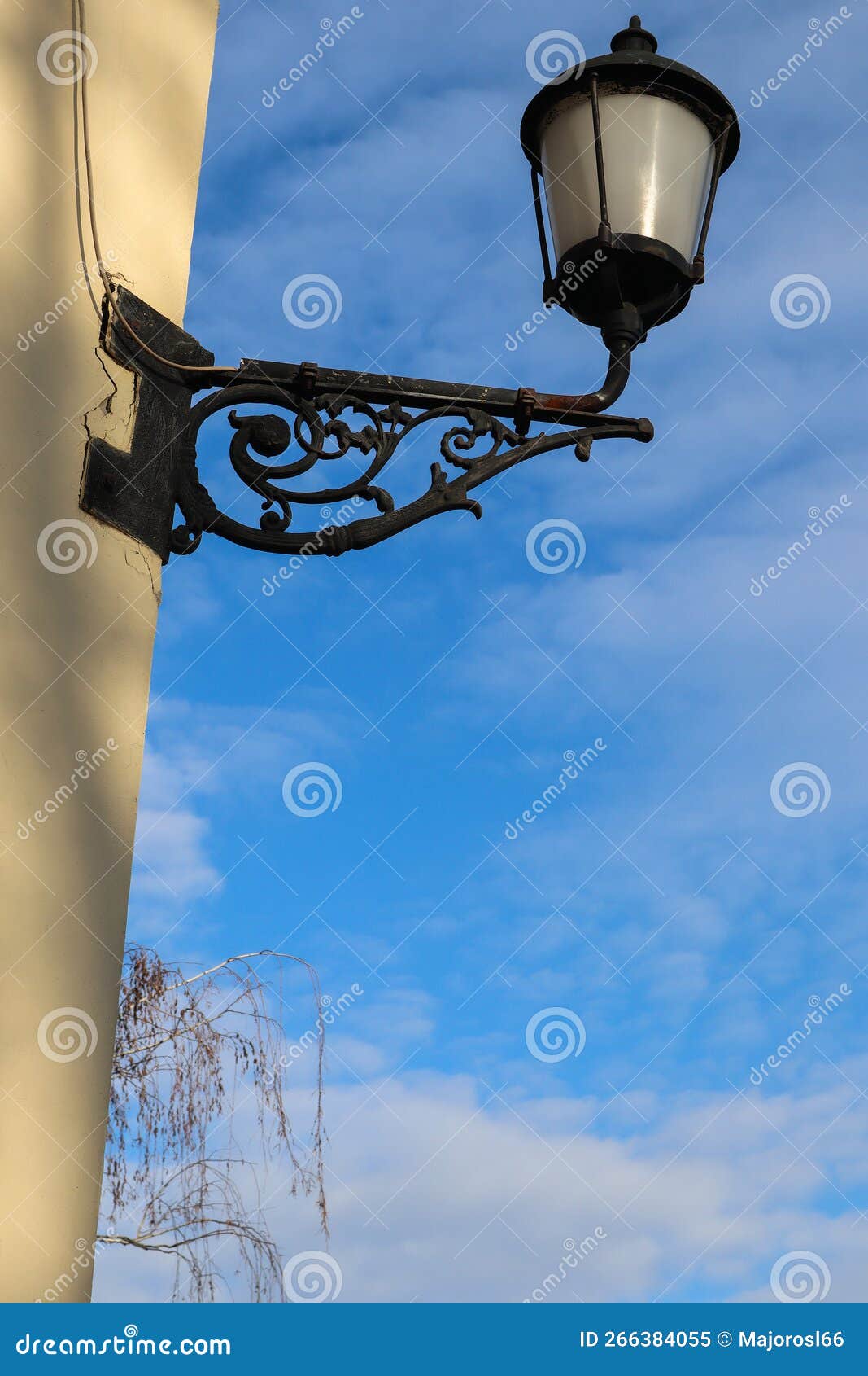 Ornate Street Light on the Wall of a Building Stock Image - Image of ...