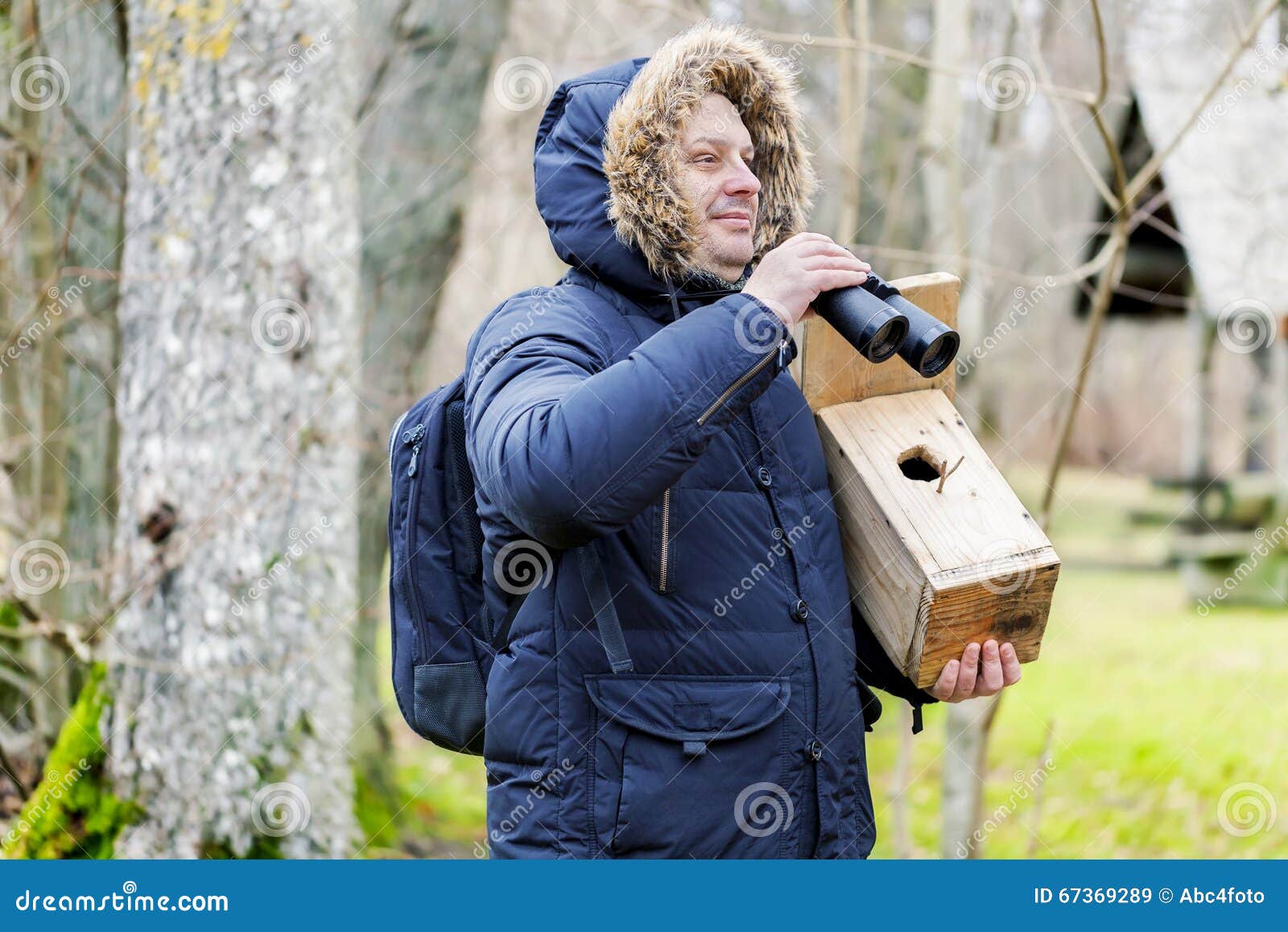 Ornithologist with Binoculars and Bird Cage in the Park Stock Image ...