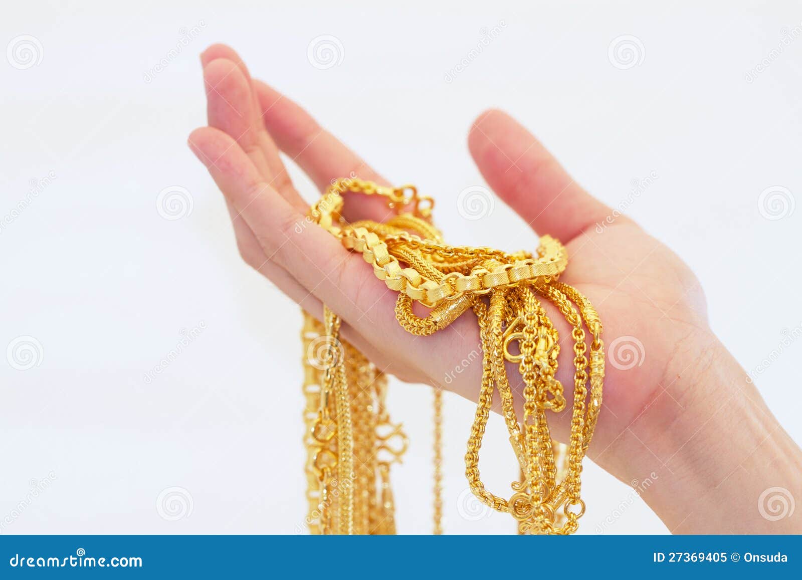 Oro en la mano imagen de archivo. Imagen de preciosamente - 27369405