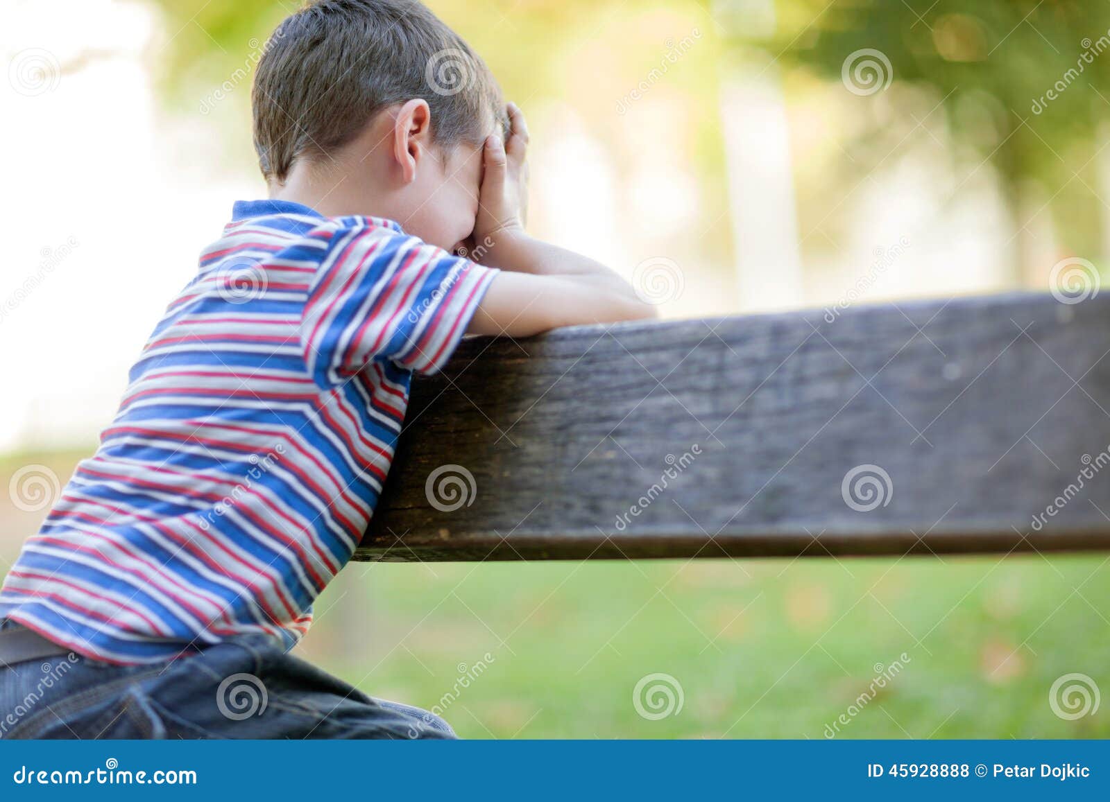 Orphan, Unhappy Boy Sitting on a Park Bench and Crying Stock Photo ...