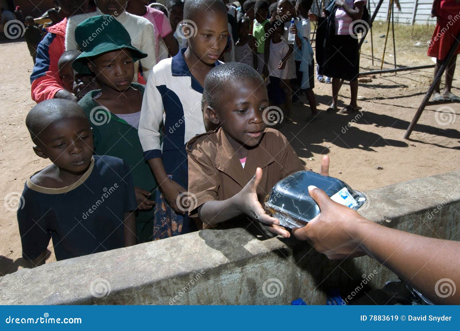 Orphans Receiving Lunch editorial stock image. Image of youth - 7883619