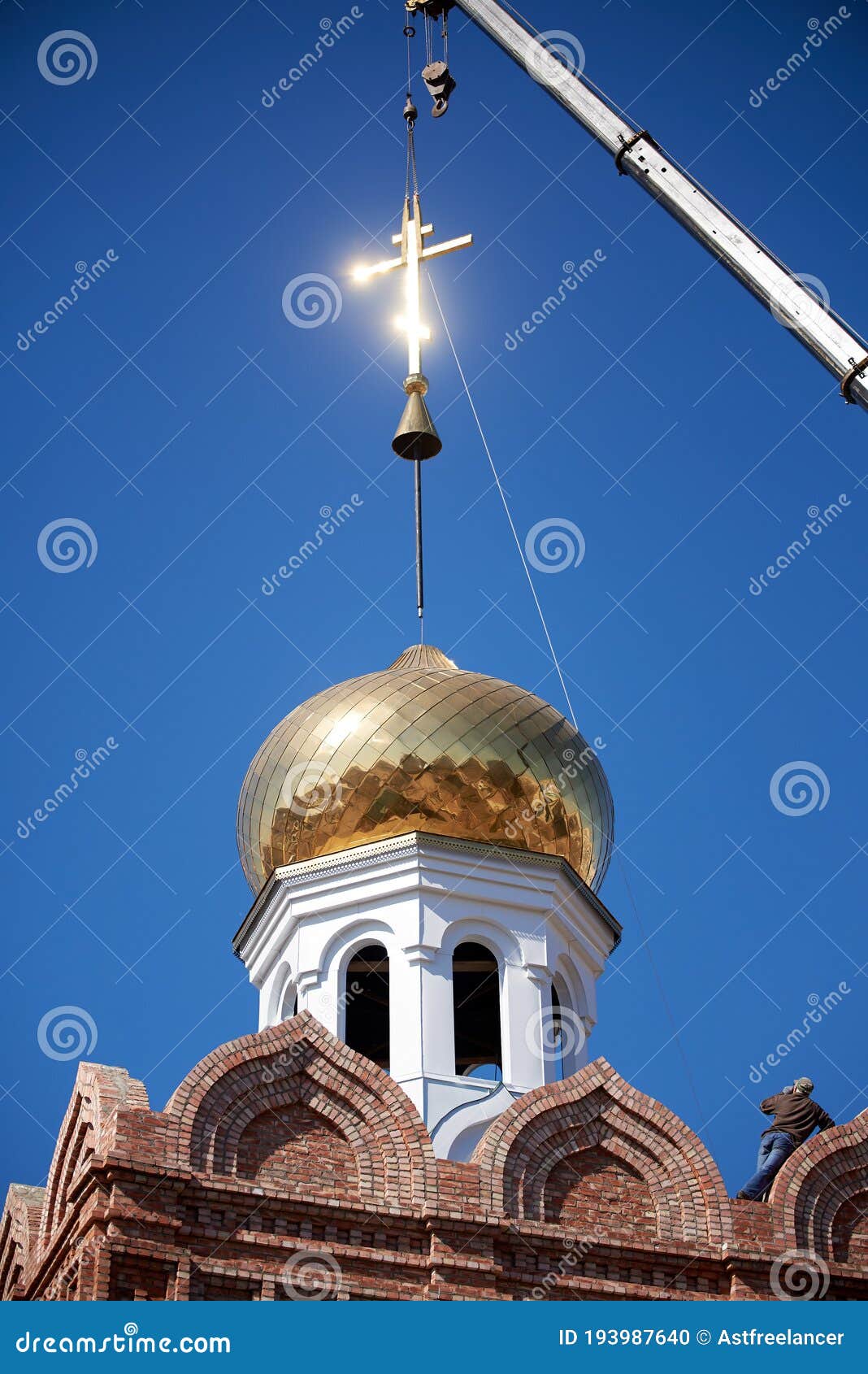A Sparkling Gilded Cross is Installed on the Dome of an Orthodox Church ...