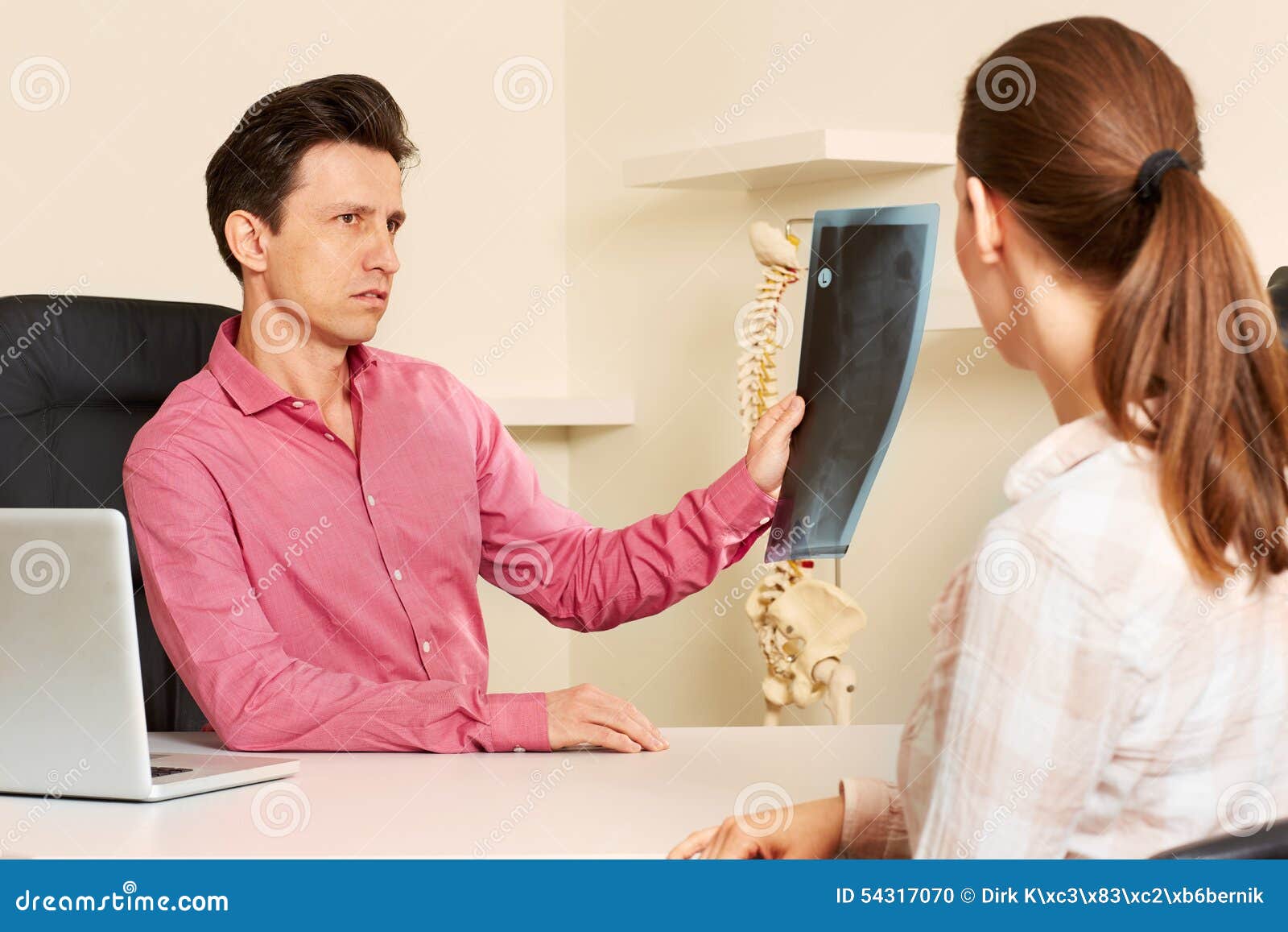 Orthopedic Surgeon with a Patient in Treatment Stock Photo - Image of ...