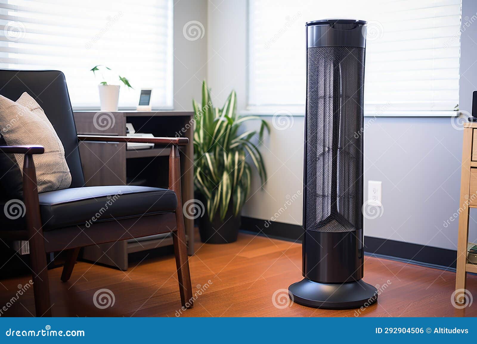 An Oscillating Tower Fan in a Minimal Office Stock Photo - Image of ...