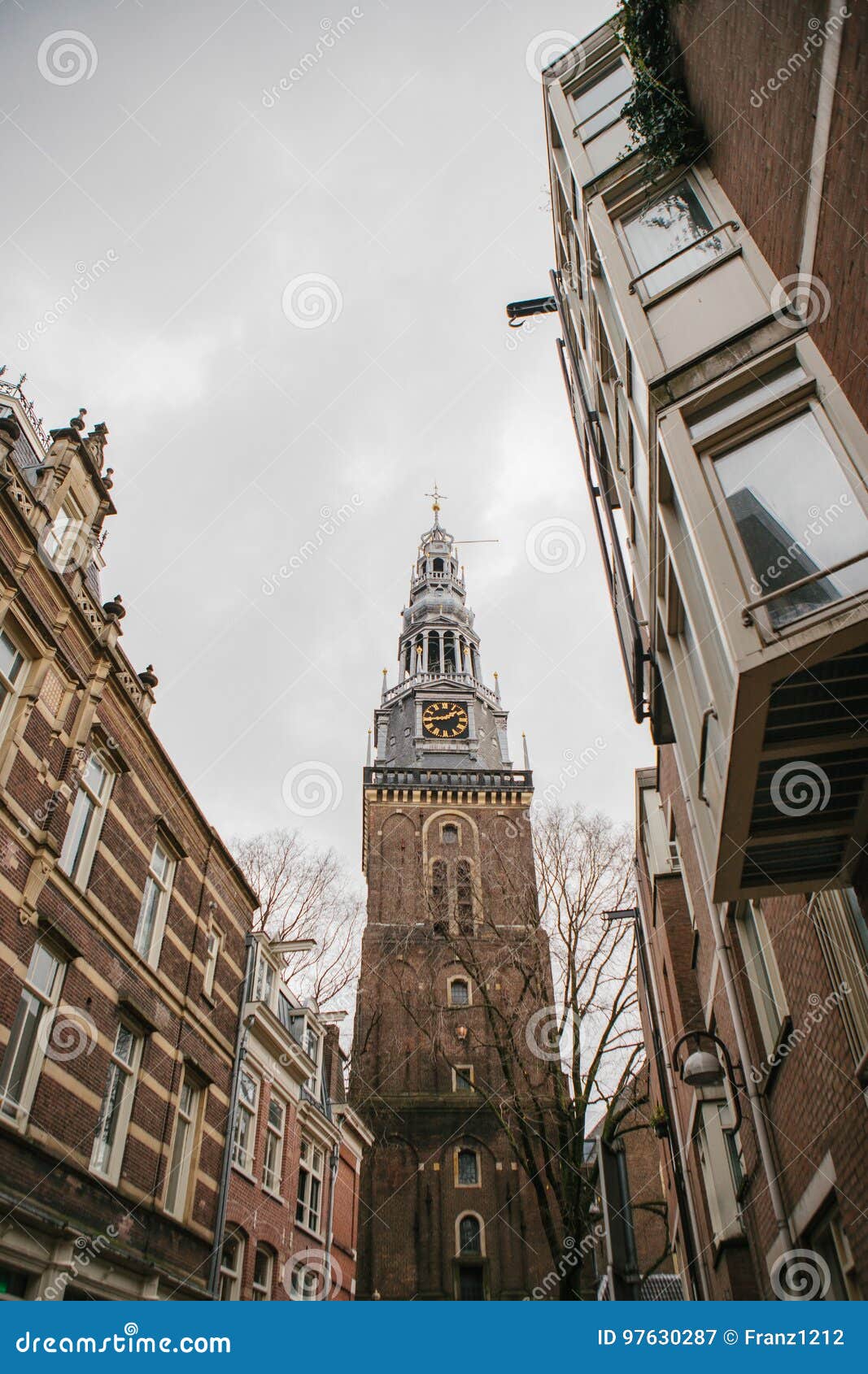 Oudekerk Bell Tower with Clock in Amsterdam, Netherlands Stock Image ...