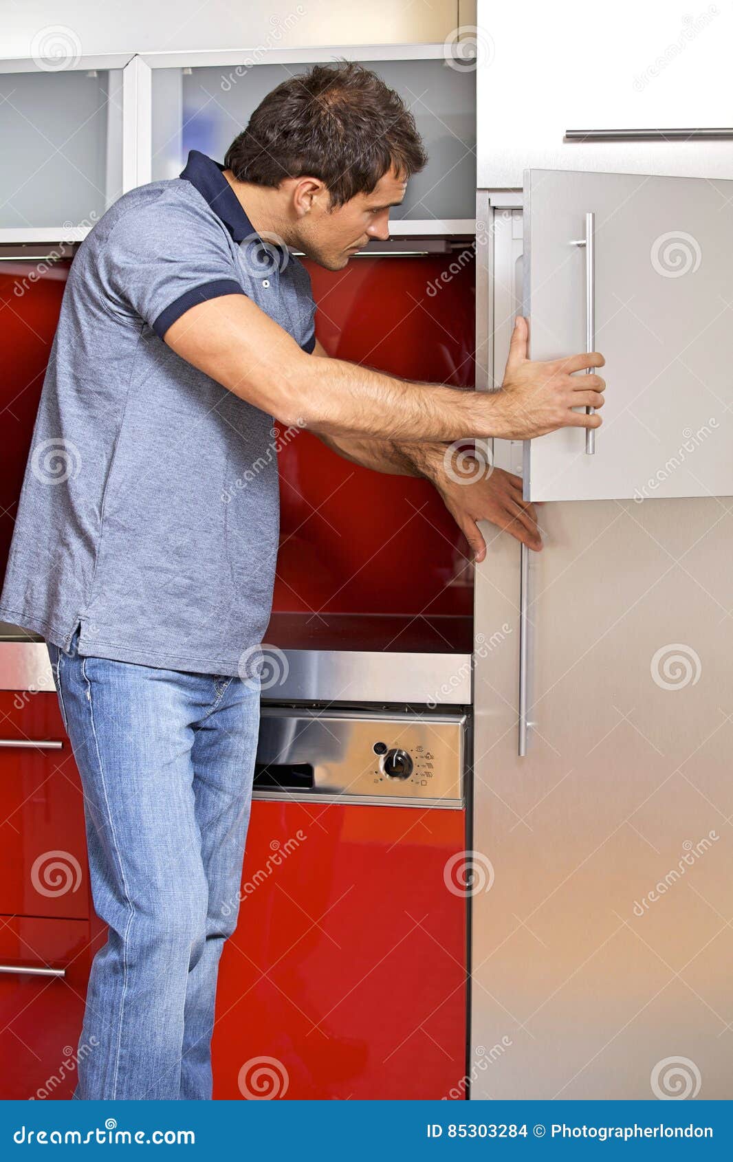 Oung Man Looking in Refrigerator Stock Photo - Image of clothing, life ...