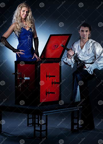 Ouple Performing Sword Box Illusion Stock Photo - Image of perform ...
