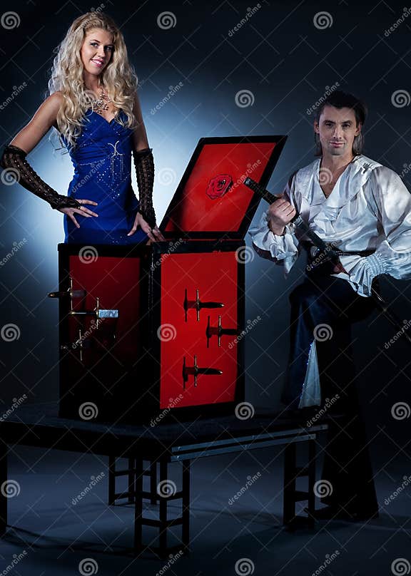 Ouple Performing Sword Box Illusion Stock Photo - Image of perform ...