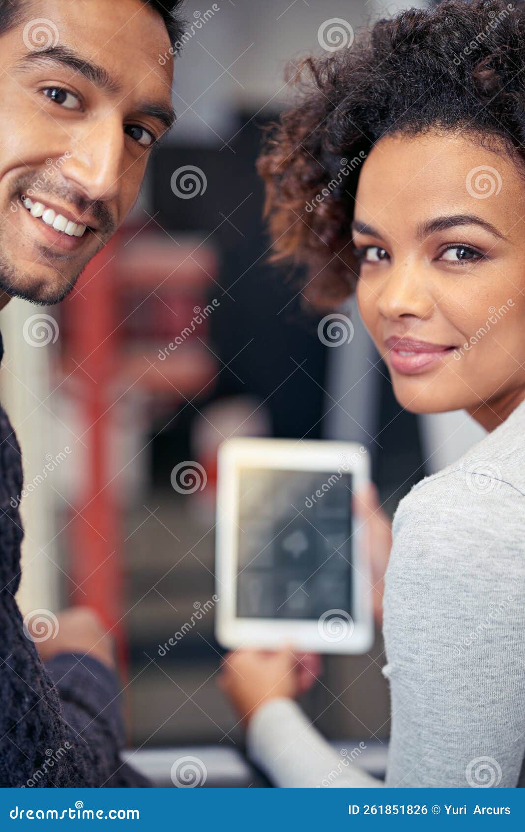 Our Compact Assistant. Portrait of Two Colleagues Using a Digital ...