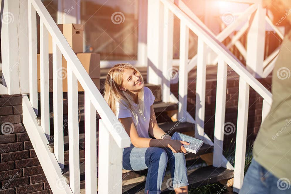 First Home Swith New Home Owners on Step Stock Photo - Image of home ...