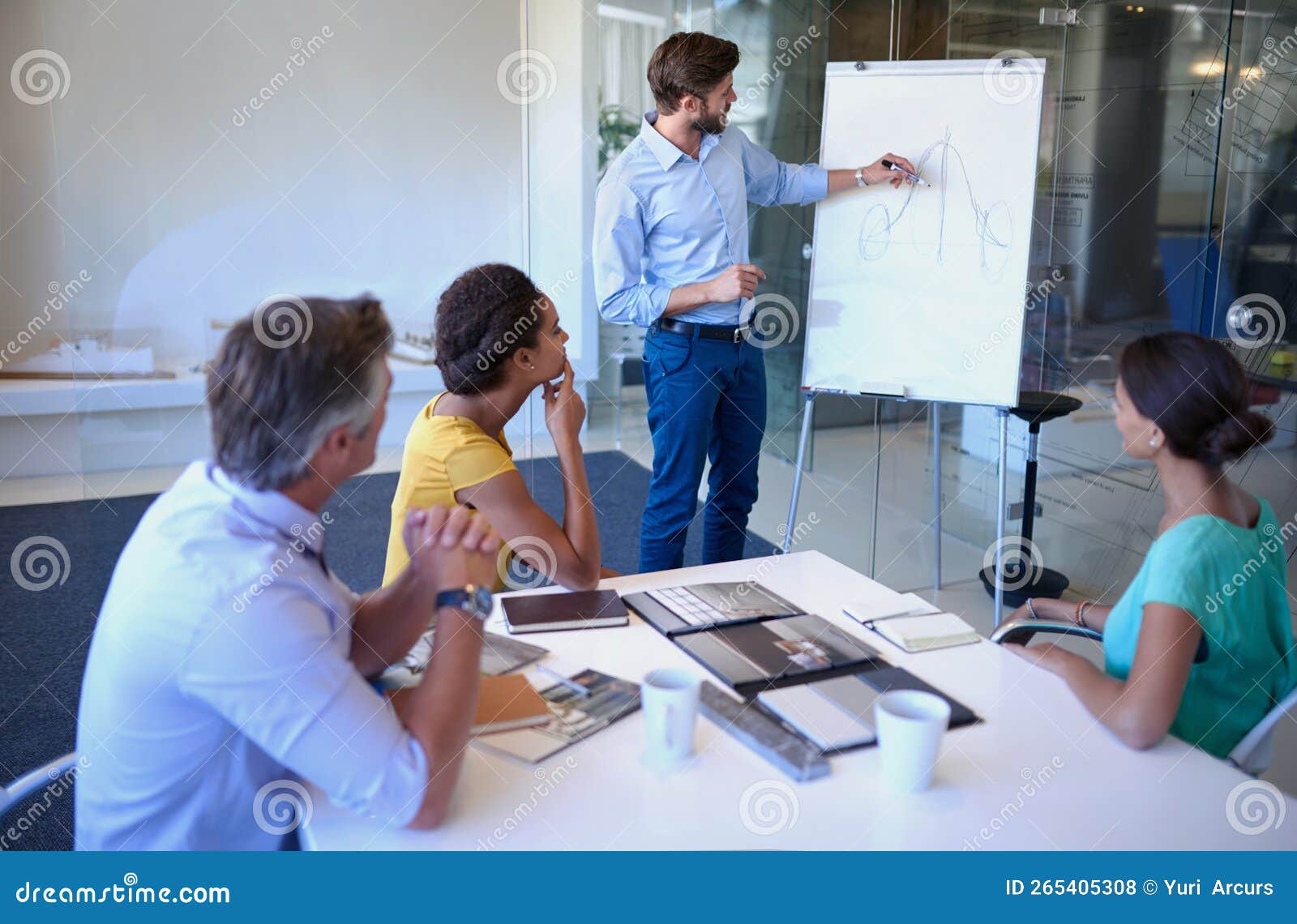 This is Our Target Area. a Handsome Young Man Giving a Business ...