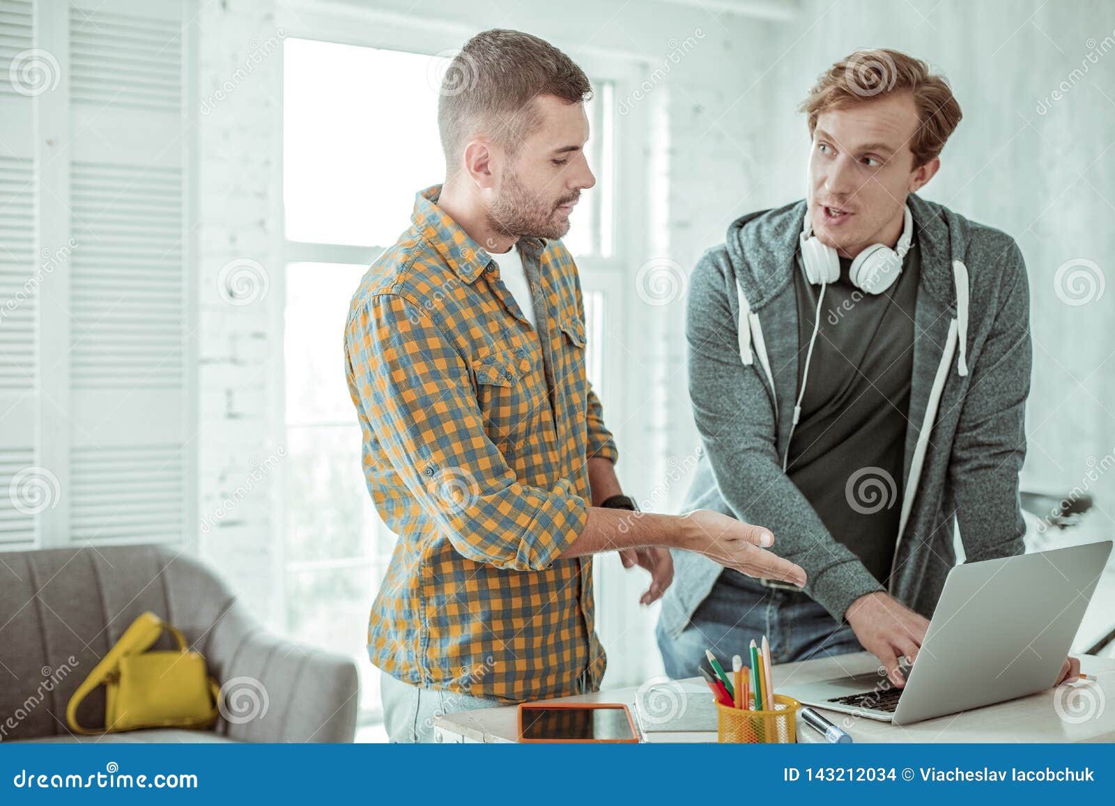 Smart Young Men Talking about Their Work Stock Photo - Image of ...