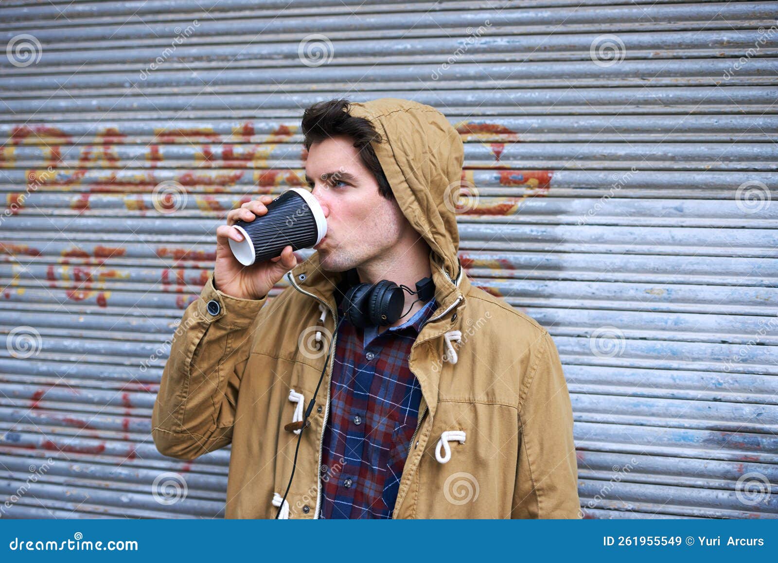 Out and about, Around Downtown. a Handsome Young Man Chilling in a ...