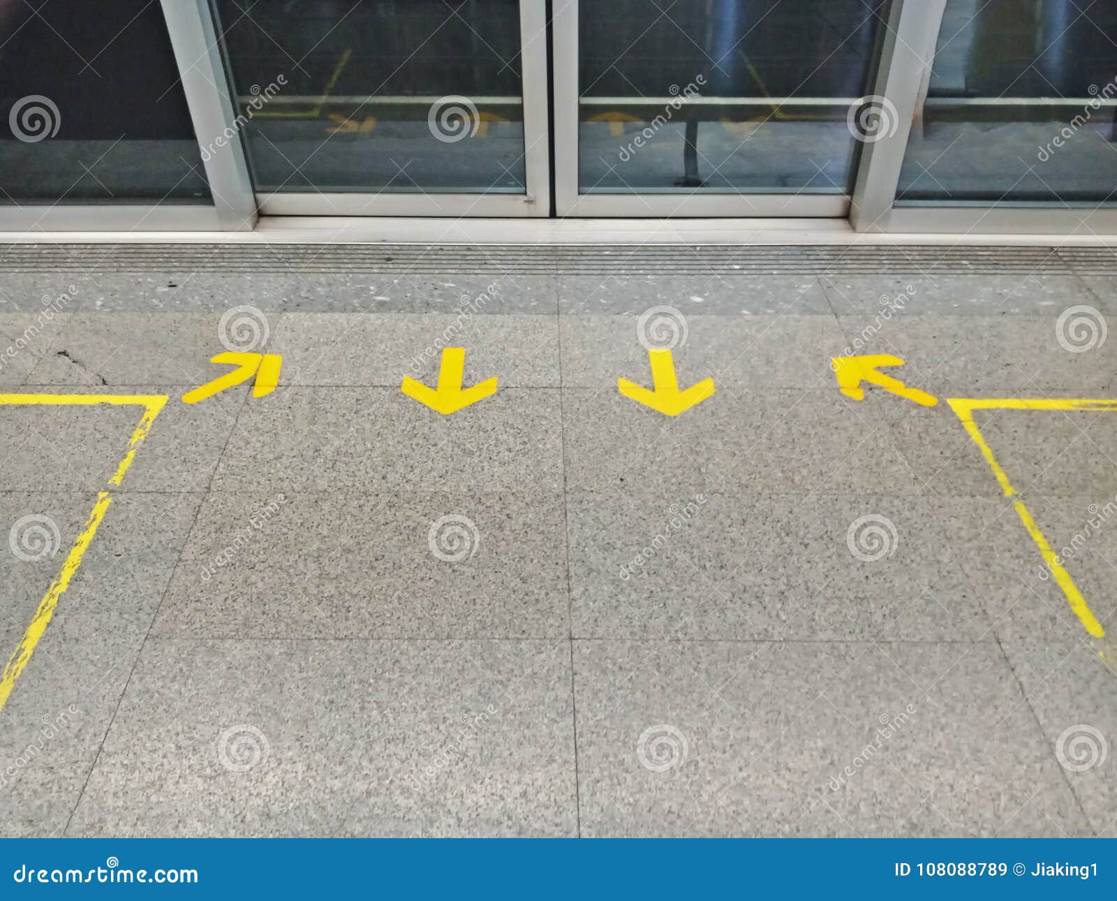 In and Out Arrow Sign for Queue at Train Station Stock Image - Image of ...