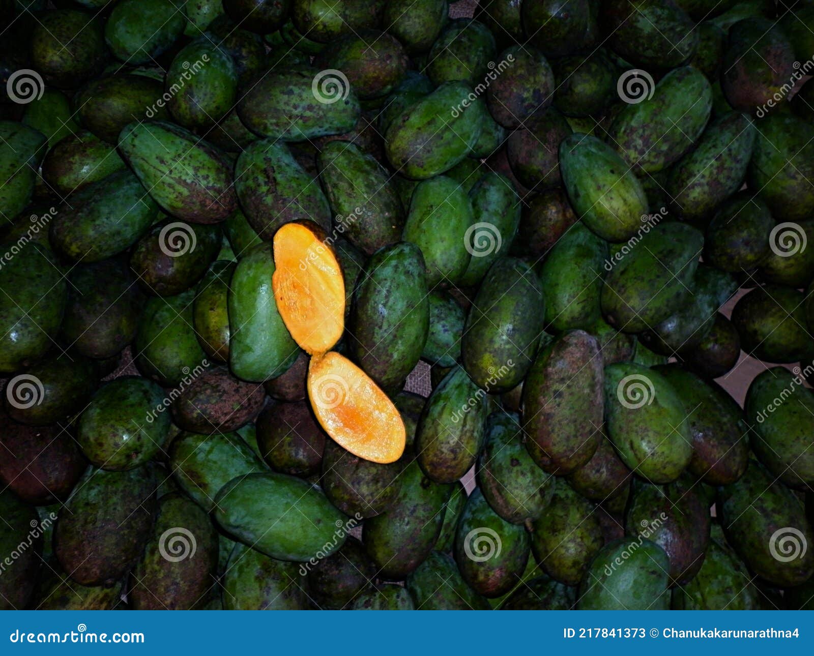 Out of Lot of Mangoes,one Mango Slice in To Two and Keep on Top of ...