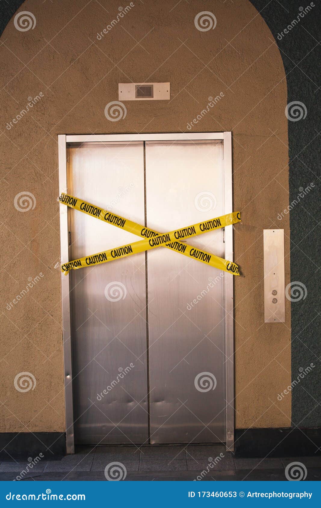 Out of Service Elevator with Yellow Tape Warning Signs Stock Image ...