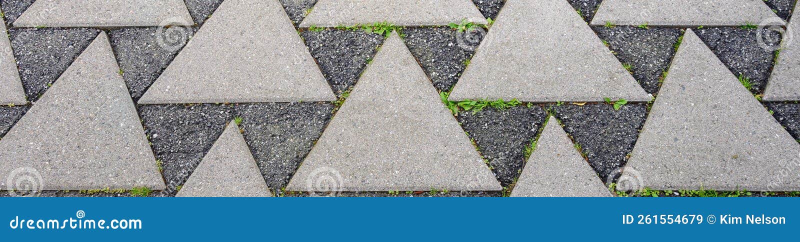 Outdoor Asphalt Patio with Triangular Shaped Concrete Inserts Stock ...