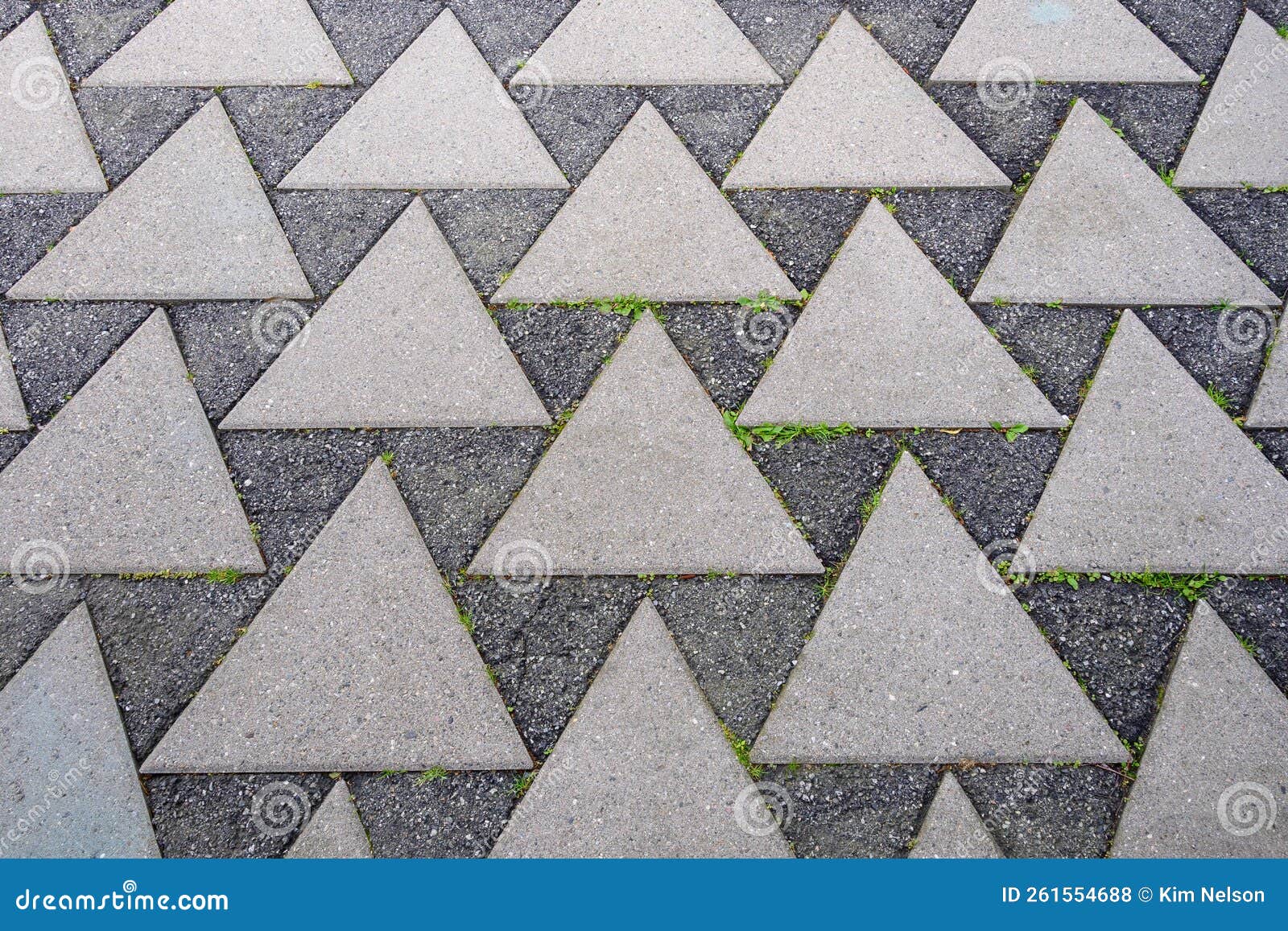 Outdoor Asphalt Patio with Triangular Shaped Concrete Inserts Stock ...