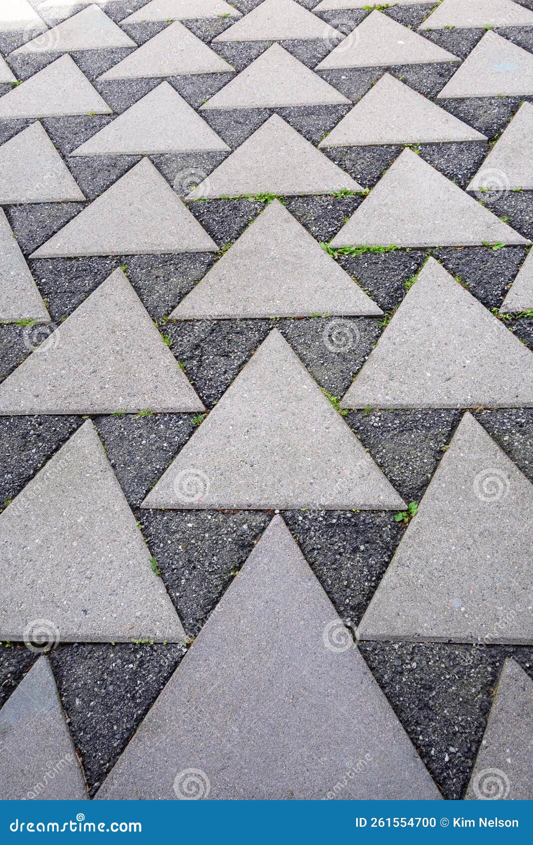 Outdoor Asphalt Patio with Triangular Shaped Concrete Inserts Stock ...