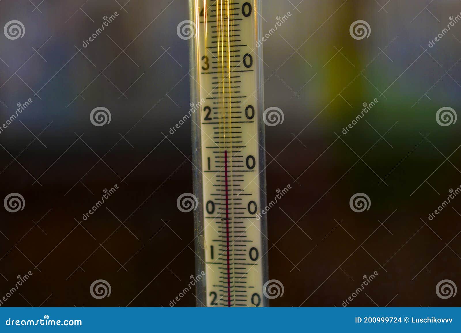 Outdoor Atmospheric Thermometer through Glass in the Evening Stock ...