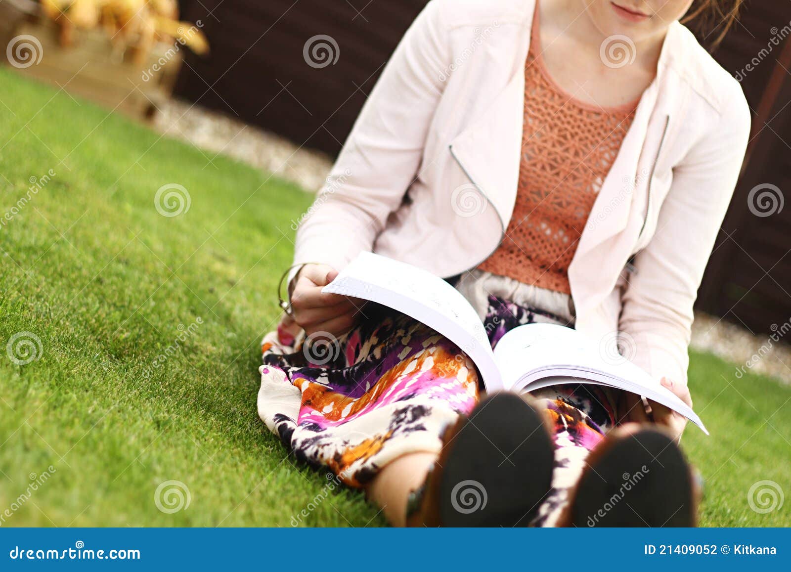 Outdoor book reading stock photo. Image of sitting, lifestyle - 21409052