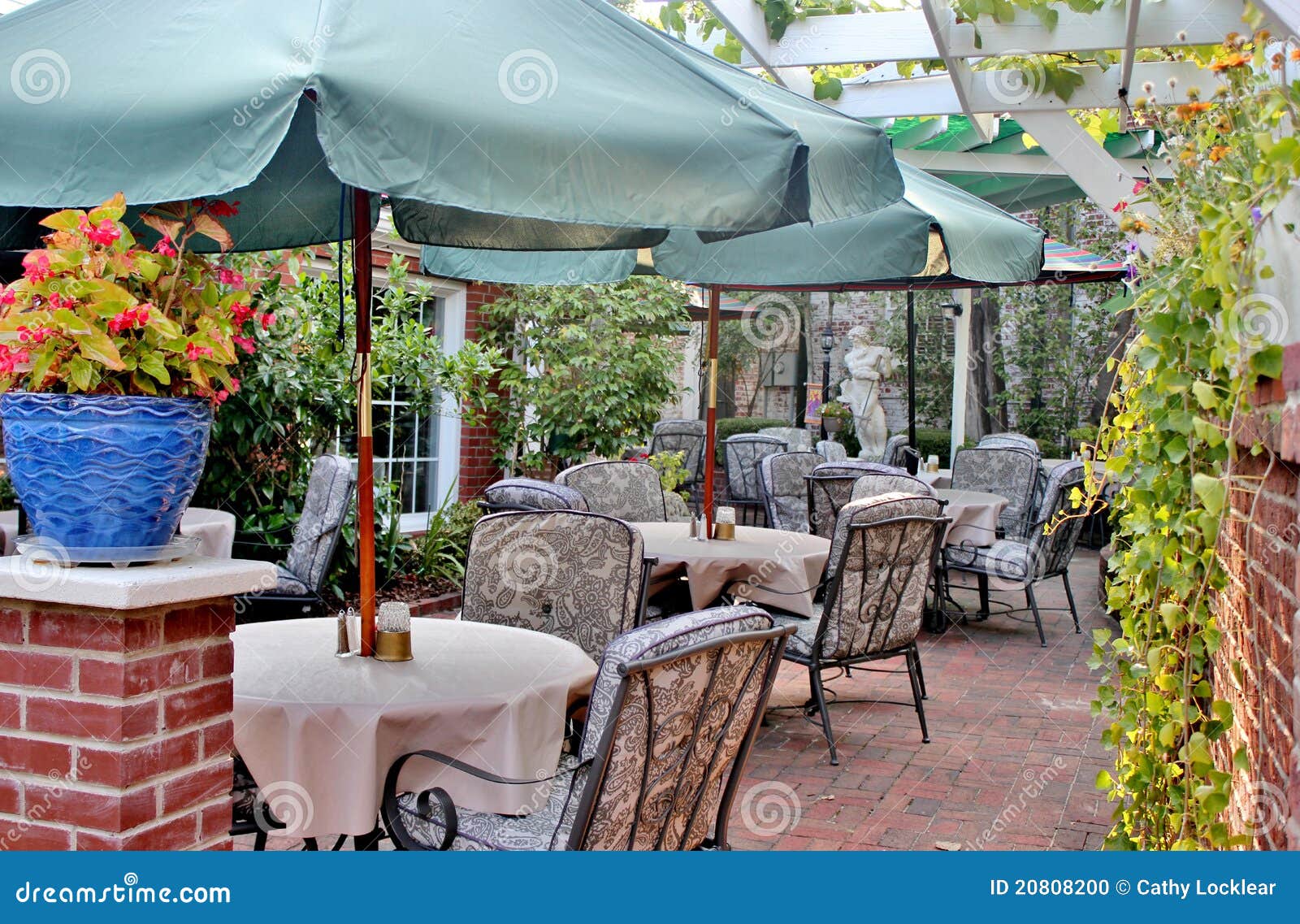 Outdoor cafe stock photo. Image of plants, umbrellas - 20808200