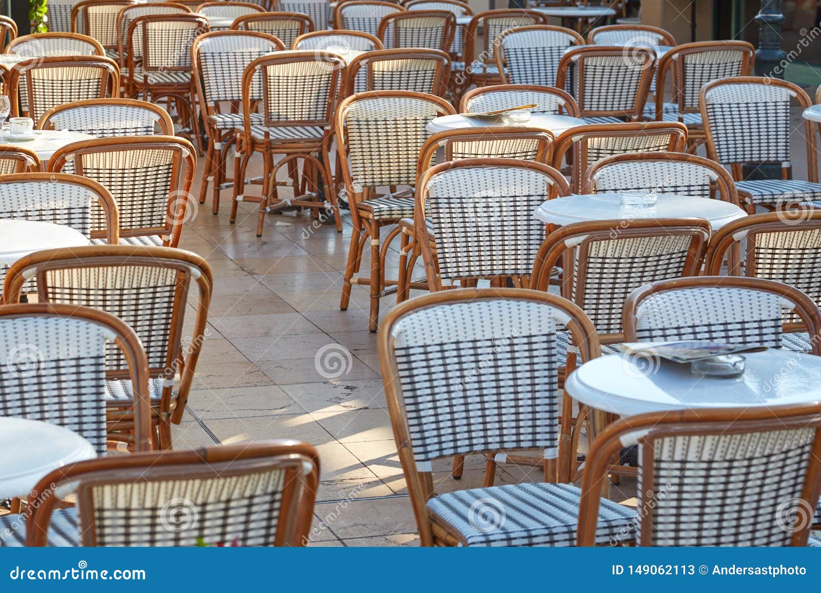 Outdoor Cafe Tables and Chairs in a Sunny Day Stock Image - Image of ...