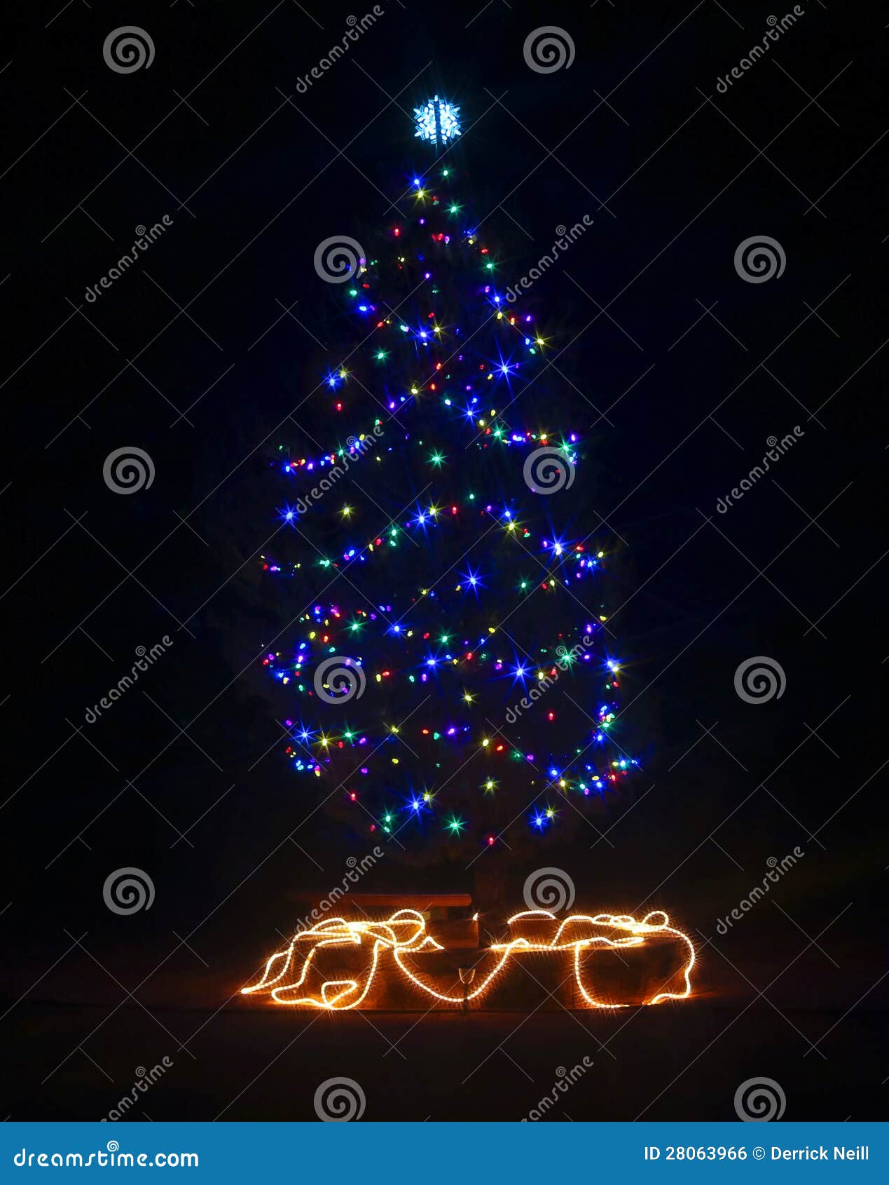 An Outdoor Christmas Tree on a Dark Night Stock Photo - Image of stars ...