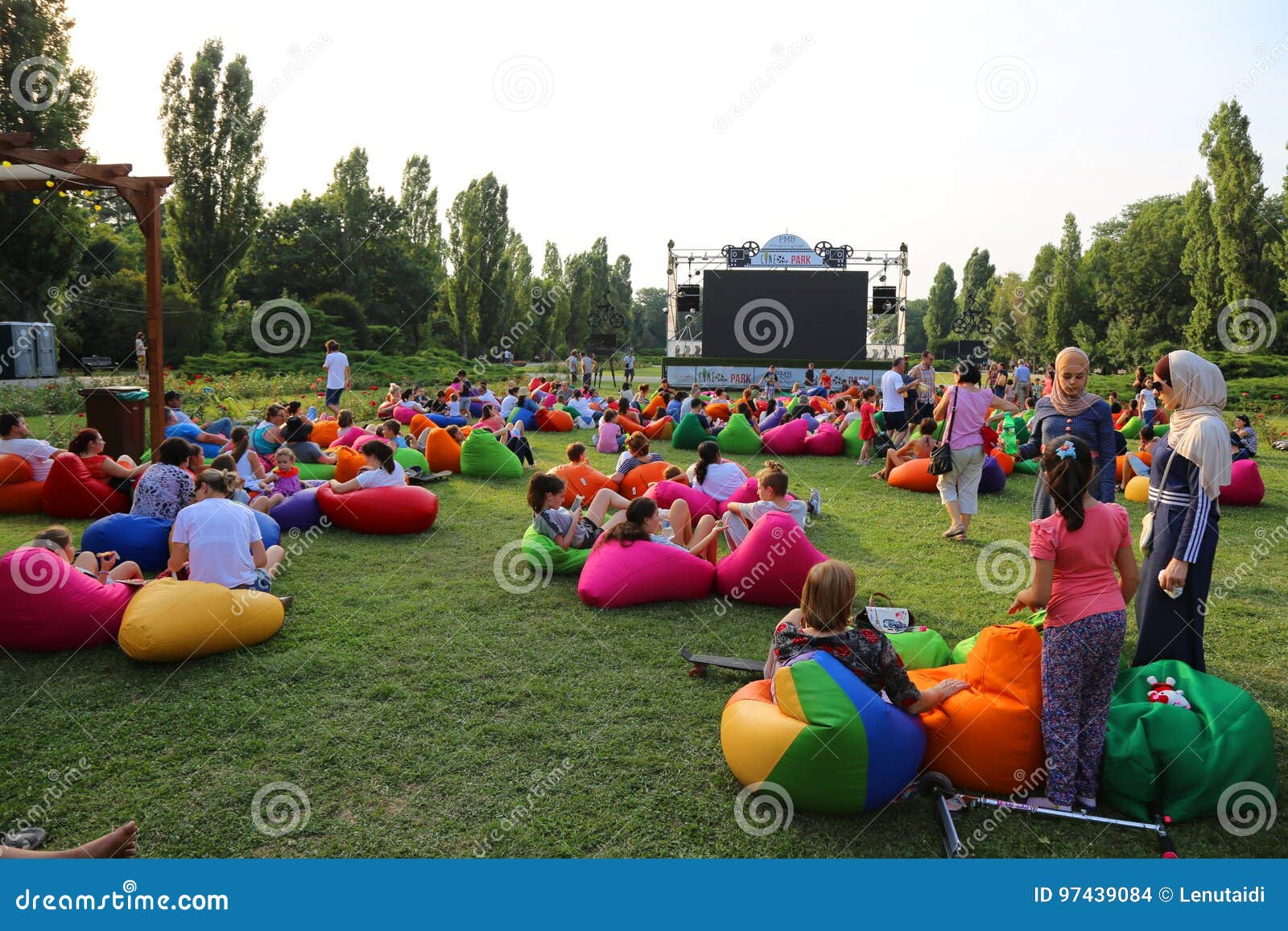 Outdoor cinema in the park editorial stock image. Image of childhood ... Outdoor cinema in the park editorial stock image. Image of childhood ...