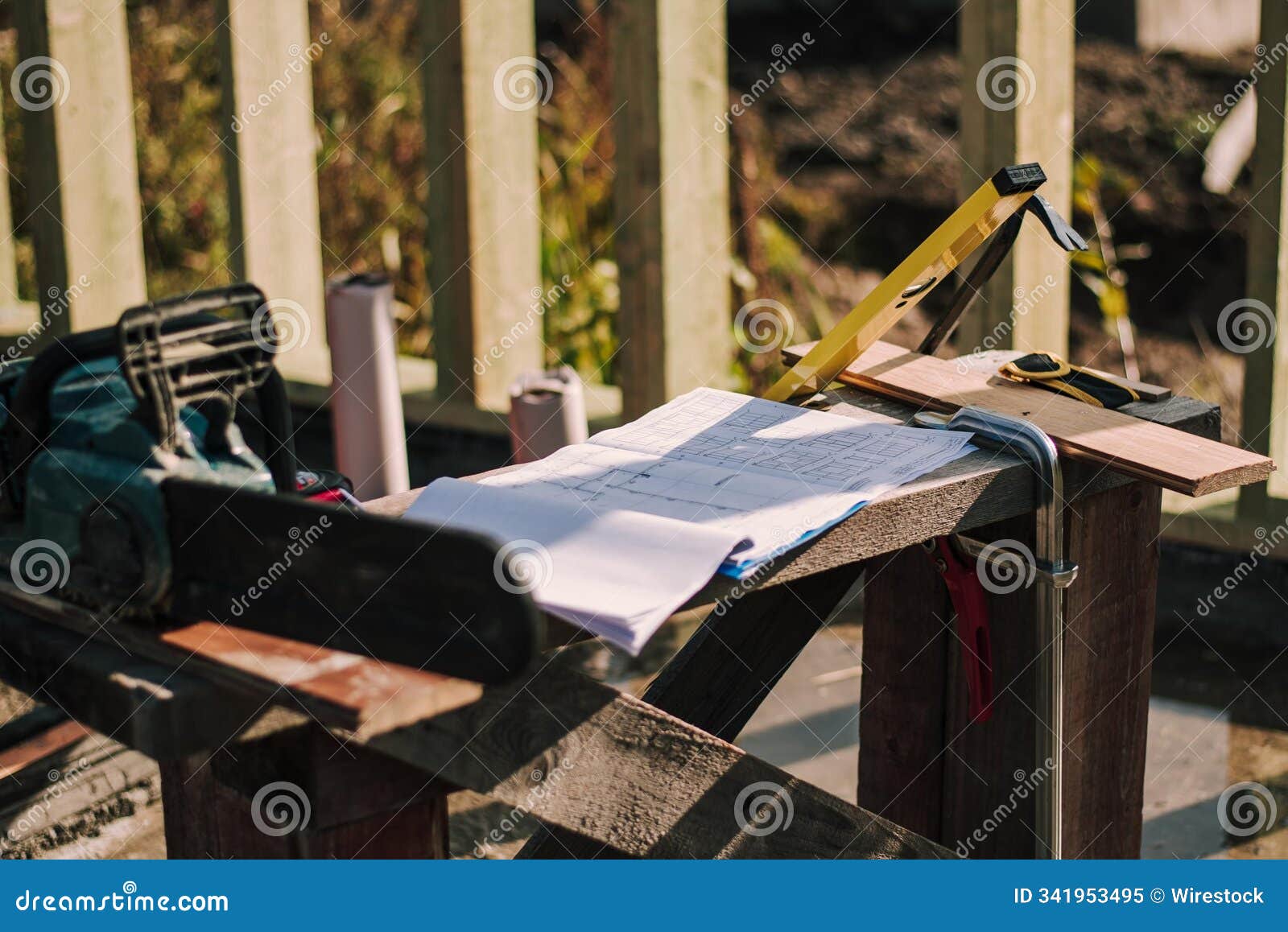 Outdoor Construction Setup with Tools and Blueprints. Stock Image ...