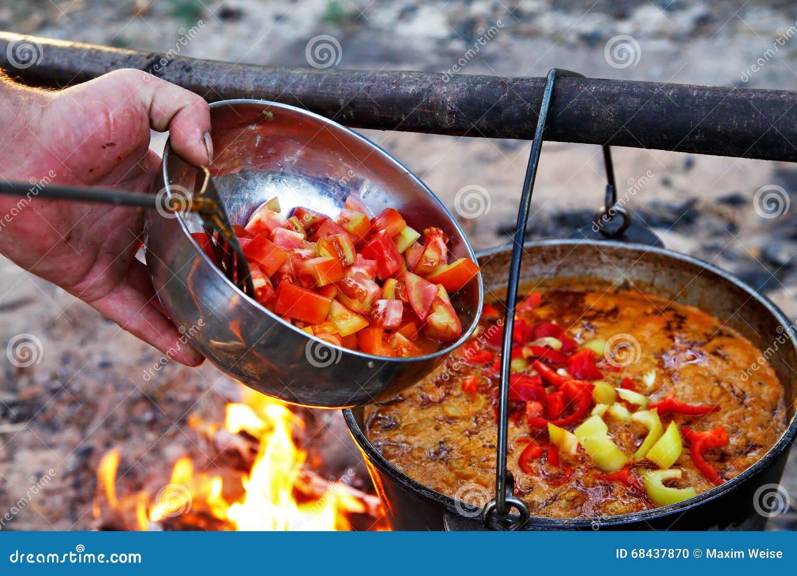 Outdoor Cooking. Making Soupe on a Fire in a Pot Stock Photo - Image of ...