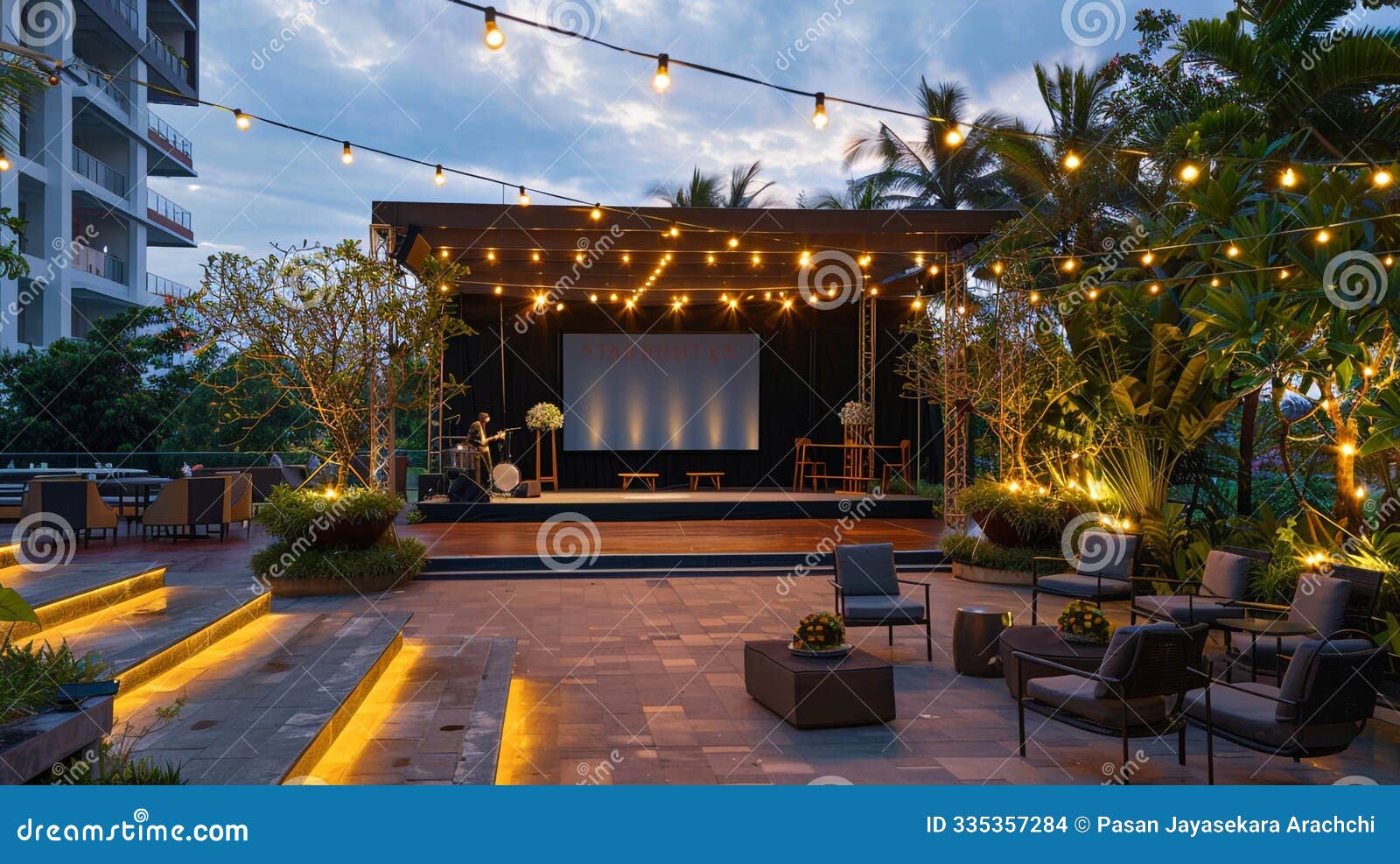 Outdoor Event Space Showcasing Stage Setup with Elegant Seating and ...