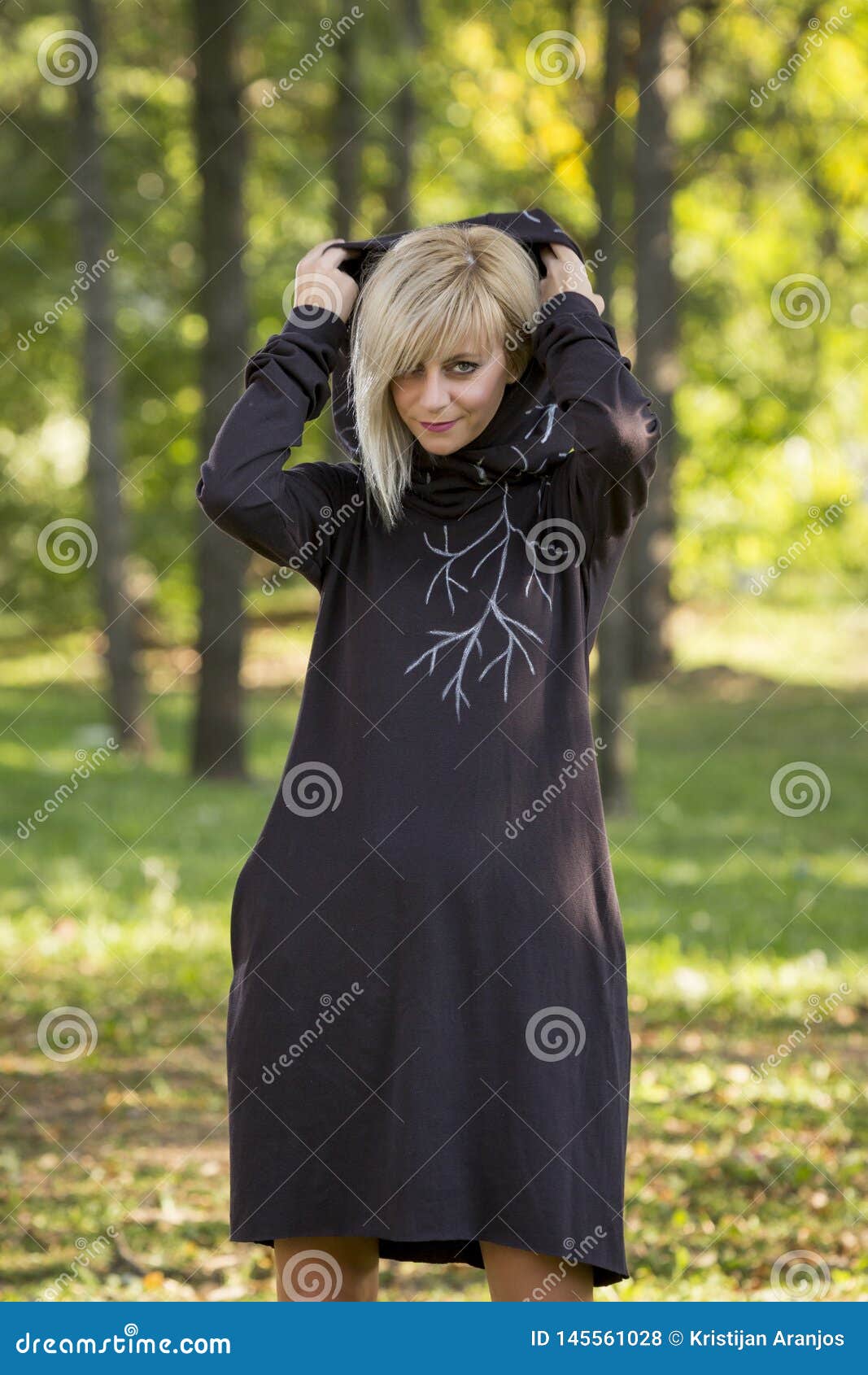 Outdoor Fashion Portrait Of Young Beautiful Woman Posing In Summer