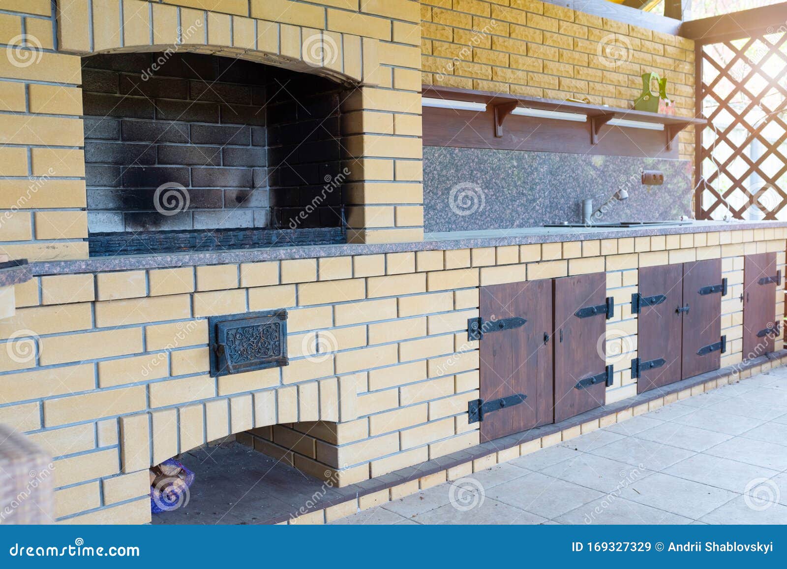 An Outdoor Fireplace for Meals and Barbeque Made of Bricks in the ...