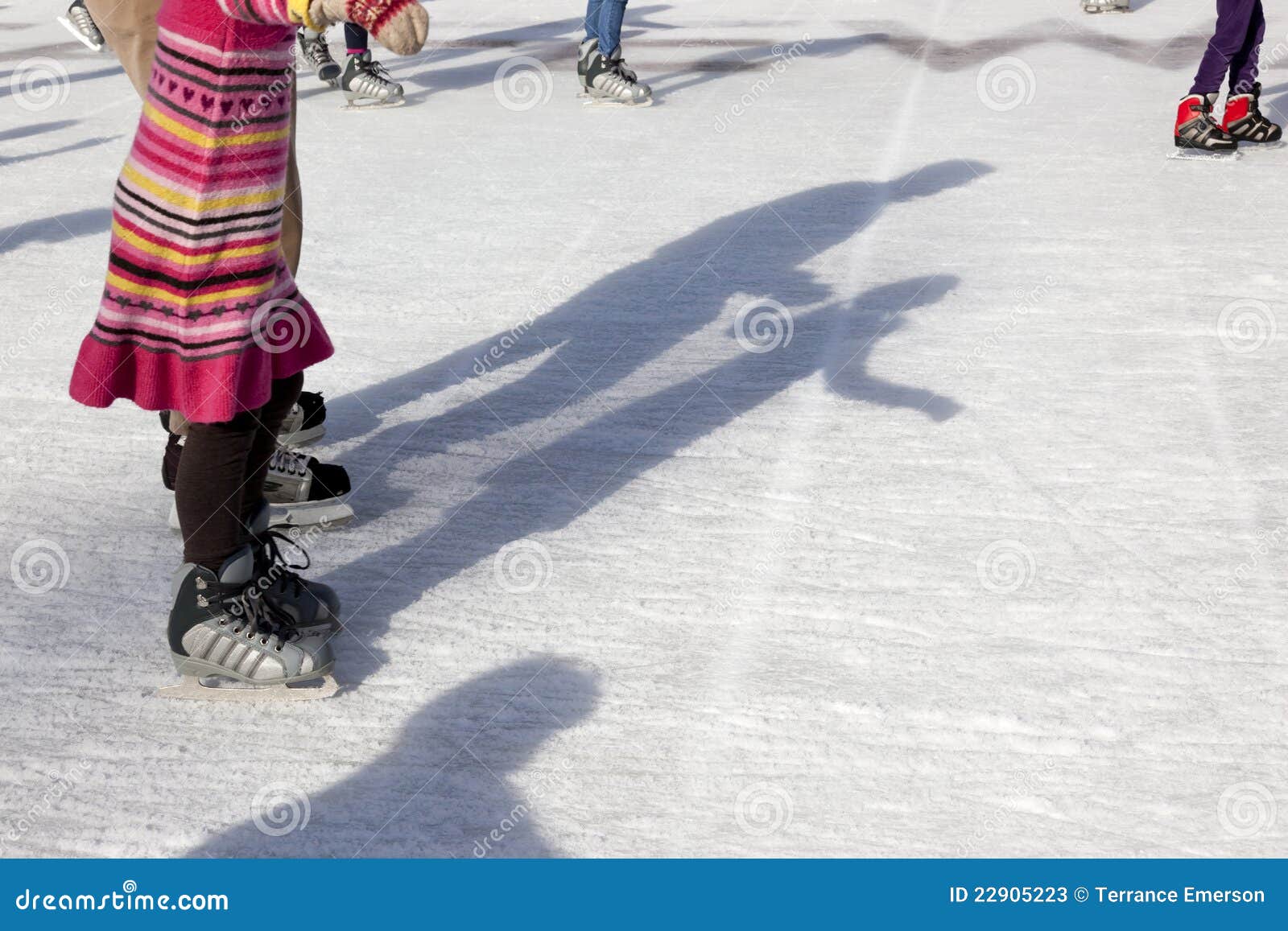 Outdoor Ice Skaters and Shadows Stock Image - Image of skating ...
