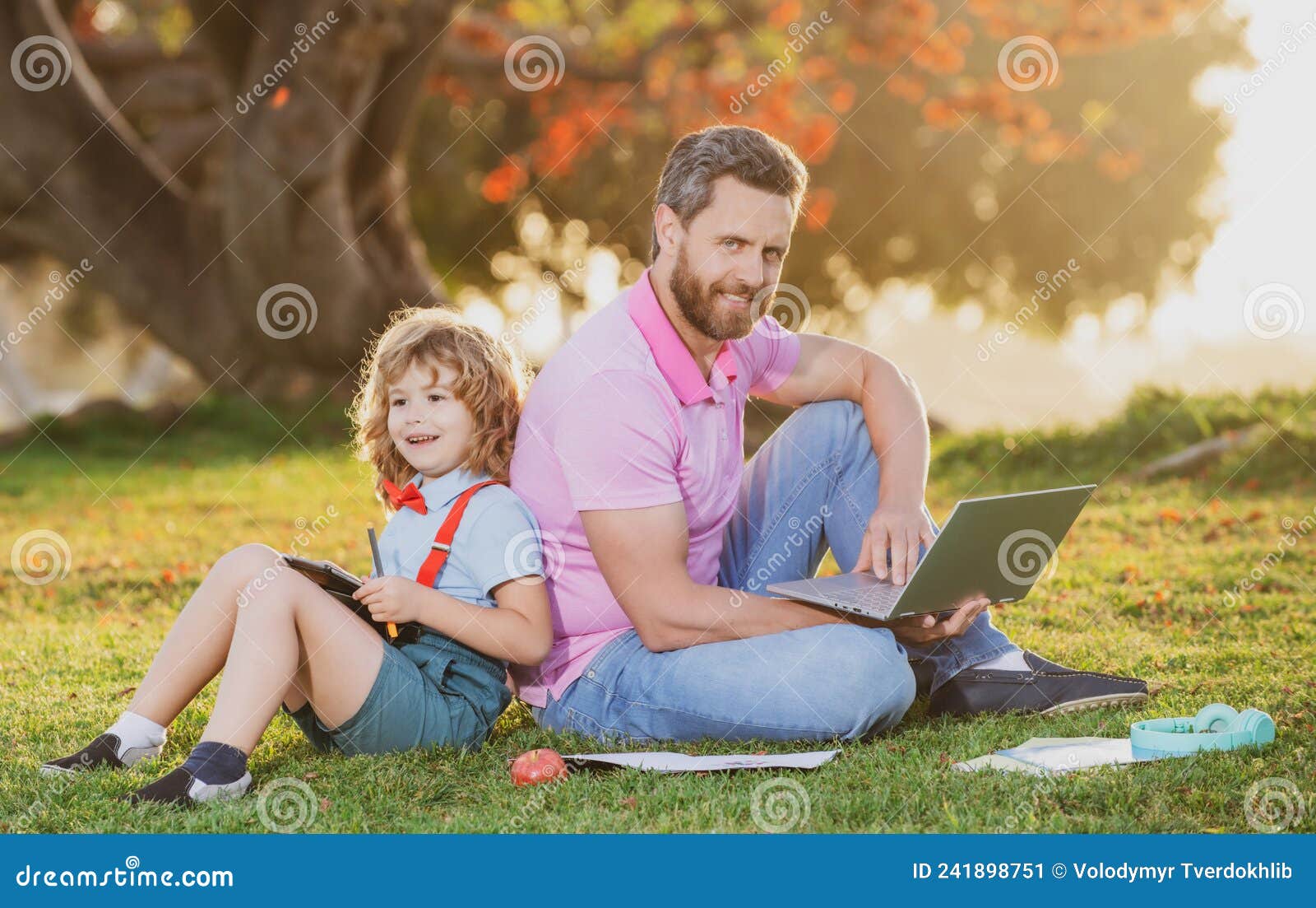 Outdoor Learning. Father with Son in Park, Preparing Homework ...