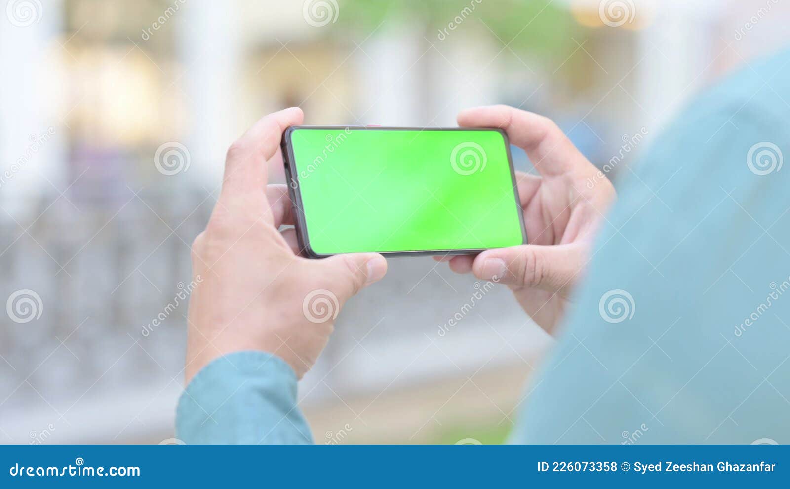 Outdoor Man Watching Smartphone with Chroma Screen Stock Photo - Image ...