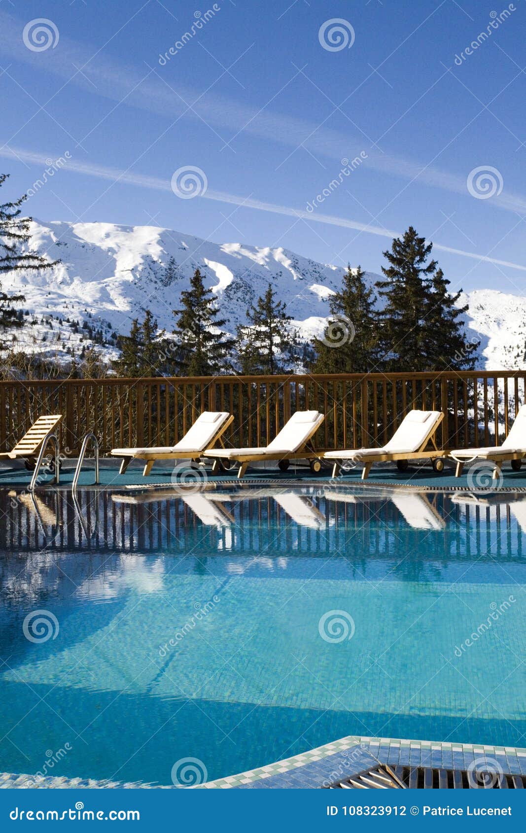 Outdoor pool in the snow stock photo. Image of mountains - 108323912
