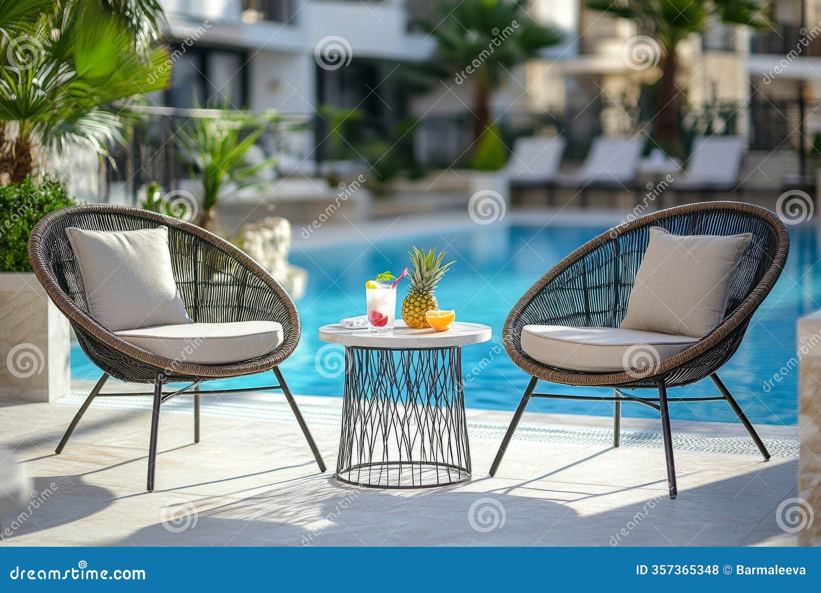 Poolside Seating Area with Stylish Chairs, a Round Table, Tropical ...