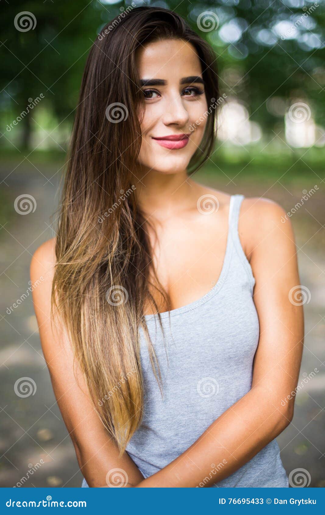 Outdoor Portrait Of Beautiful Girl Taking A Selfie With Mobile Phone