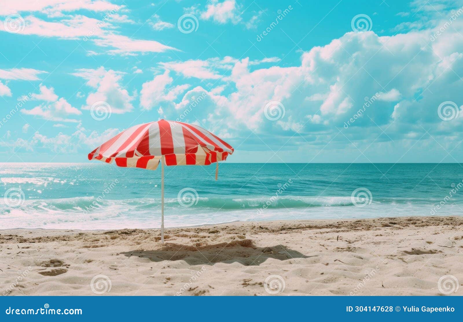 An Outdoor Red and White Striped Umbrella on a Beach Stock Photo ...