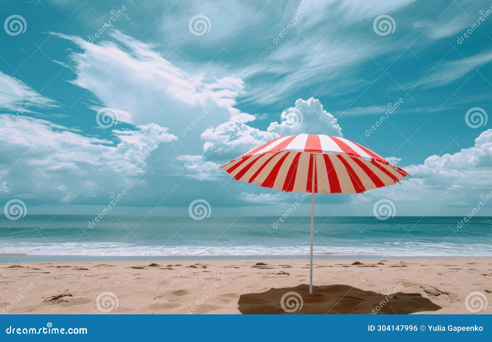 An Outdoor Red and White Striped Umbrella on a Beach Stock Photo ...
