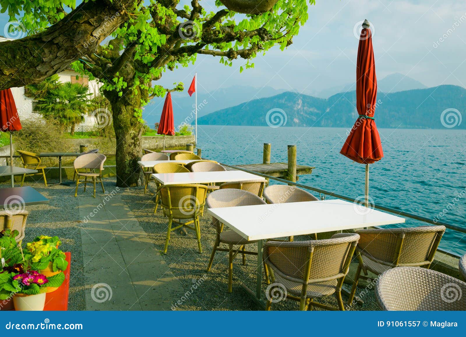 Outdoor Restaurant Over Lake and Mountains in the Background Stock ...