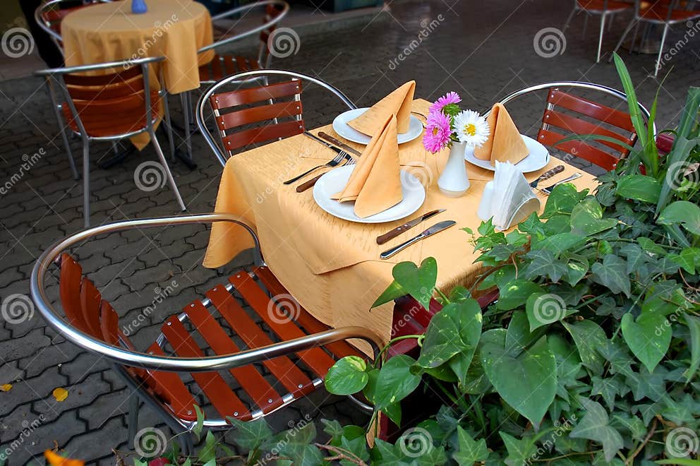 Outdoor restaurant table stock image. Image of dine, intimity - 1326763